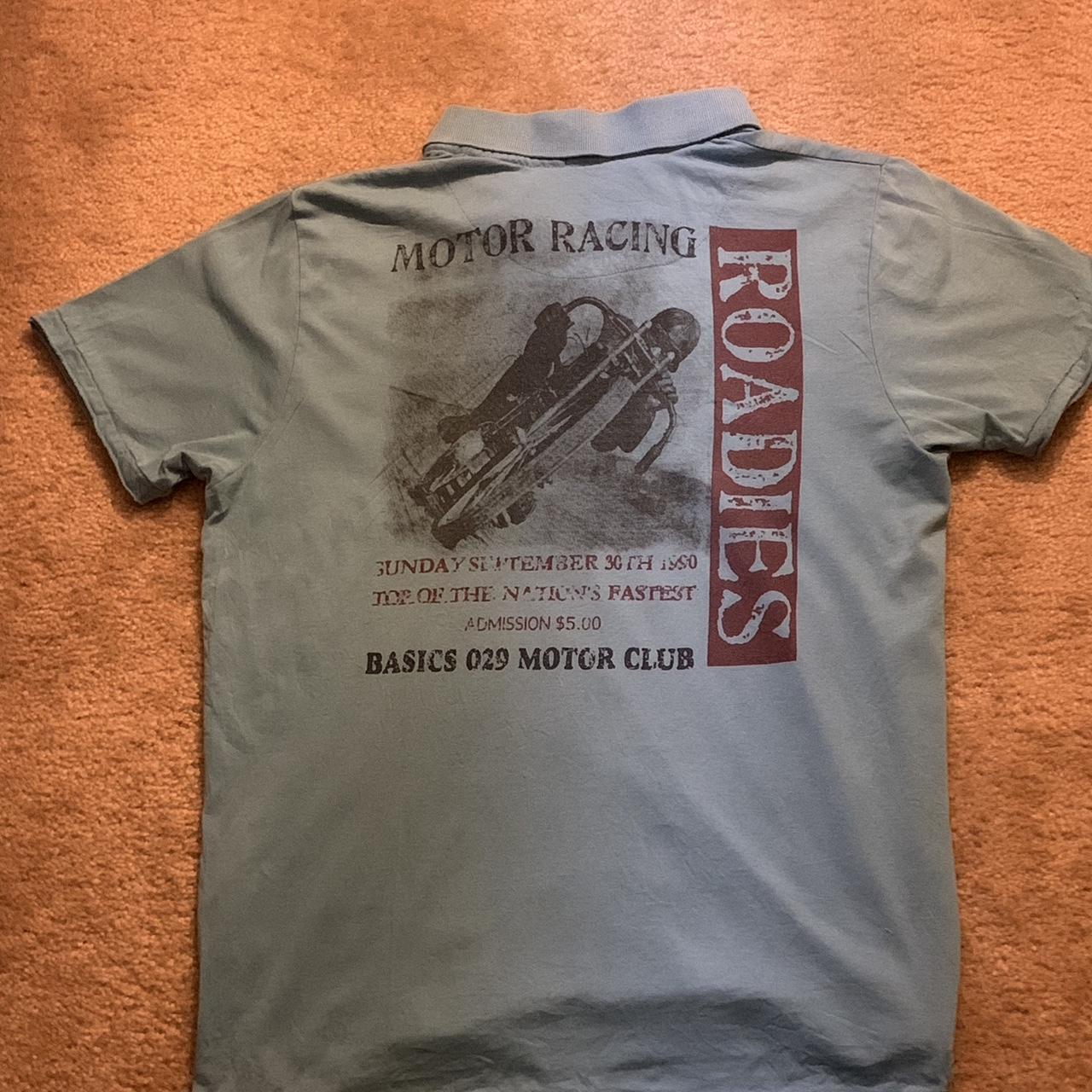 light blue motorcycle racing polo (idk what brand it... - Depop