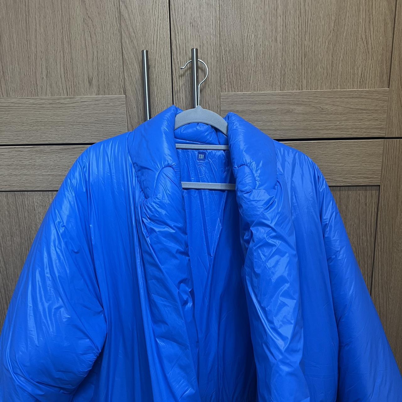 YEEZY GAP BLUE PUFFER SIZE IS LARGE CONDITION 9/10... - Depop