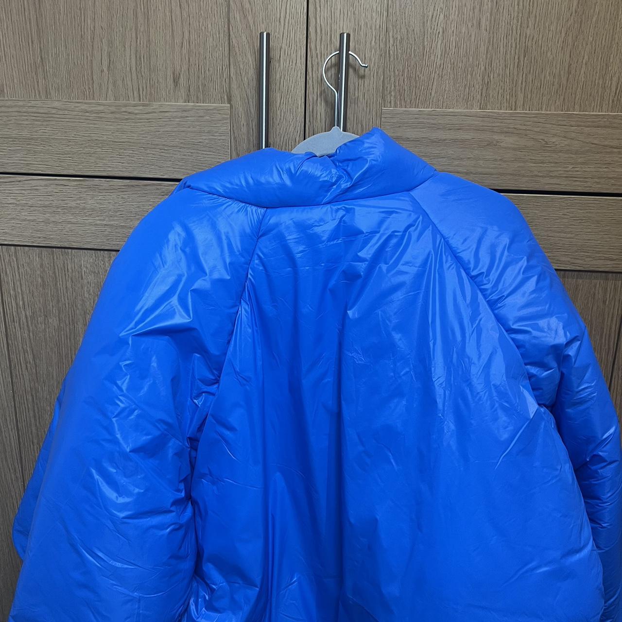 YEEZY GAP BLUE PUFFER SIZE IS LARGE CONDITION 9/10... - Depop