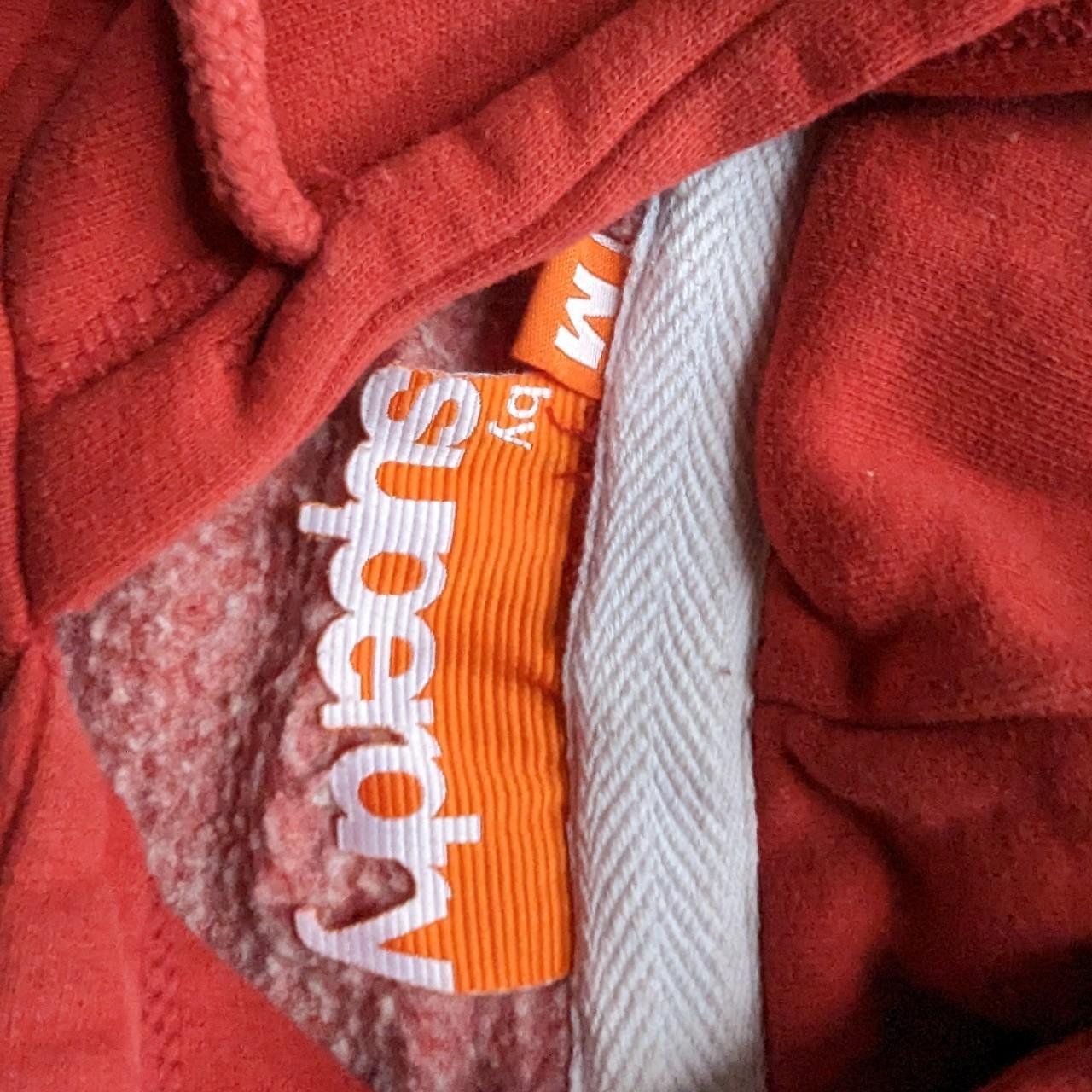 Red superdry hoodie White superdry logo Small signs... - Depop