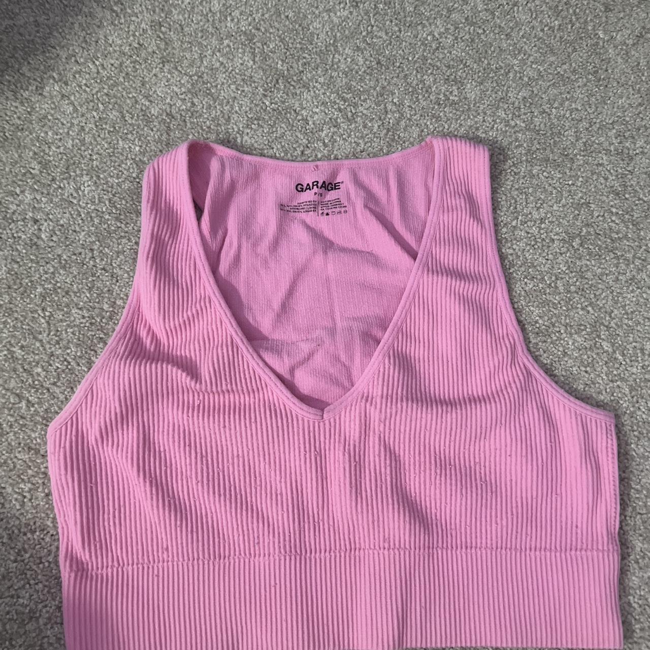 Pink garage tank top size small - Depop