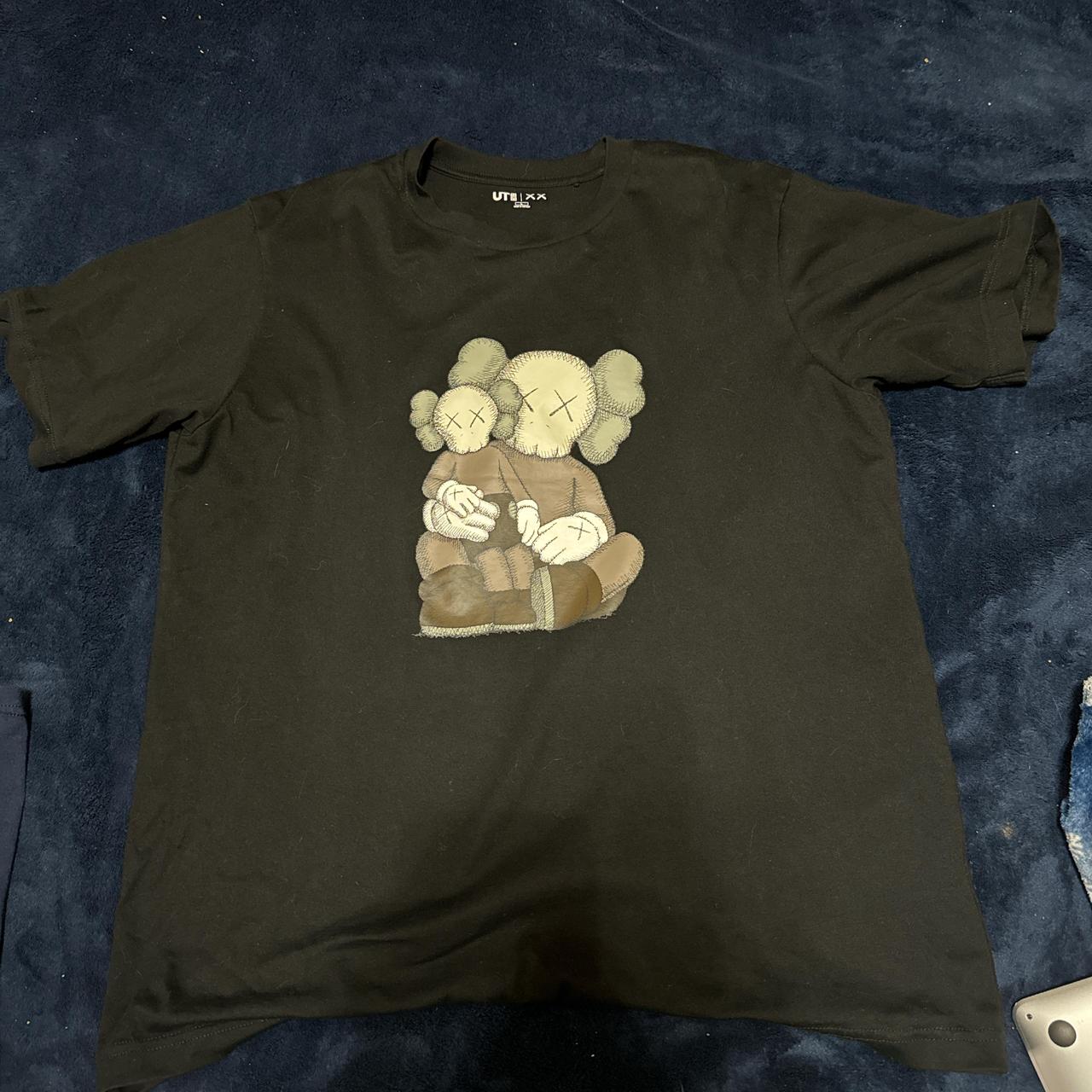 Kaws x Uniqlo Black tee Bought off Uniqlo drop Great... - Depop