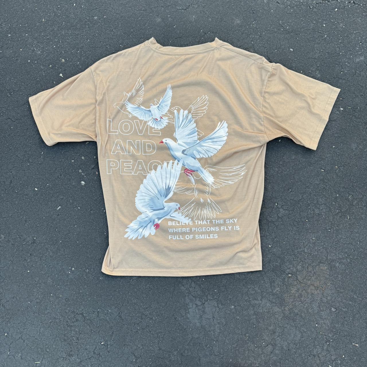 No brand Tan graphic tee Cool dove graphic on... - Depop