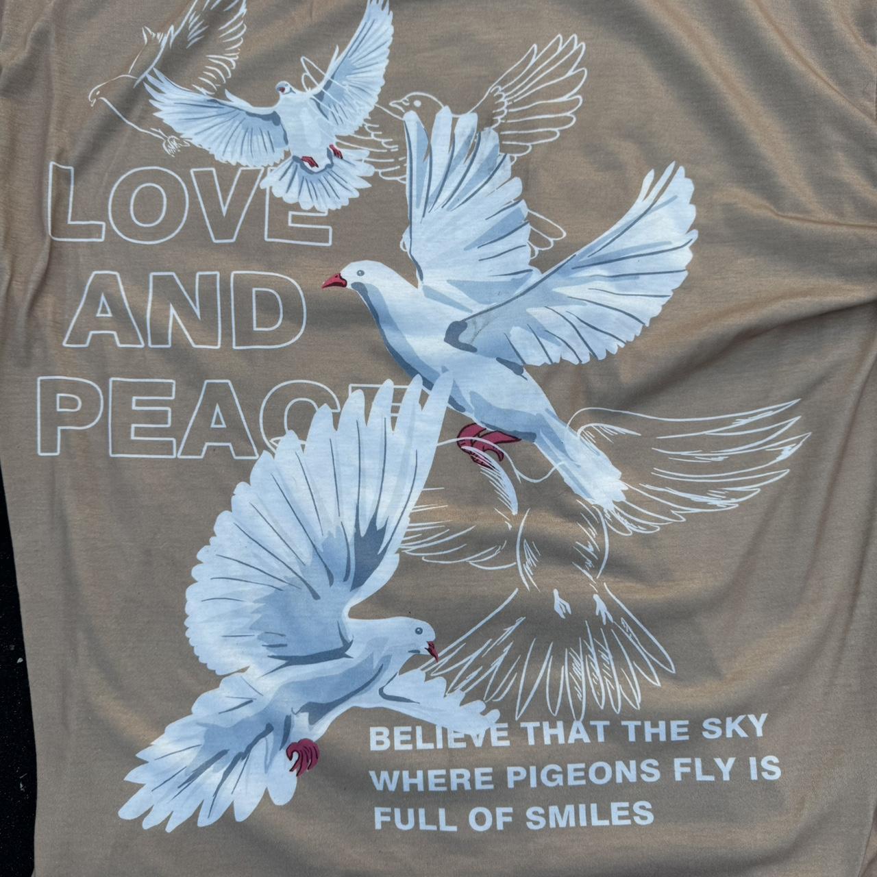 No brand Tan graphic tee Cool dove graphic on... - Depop