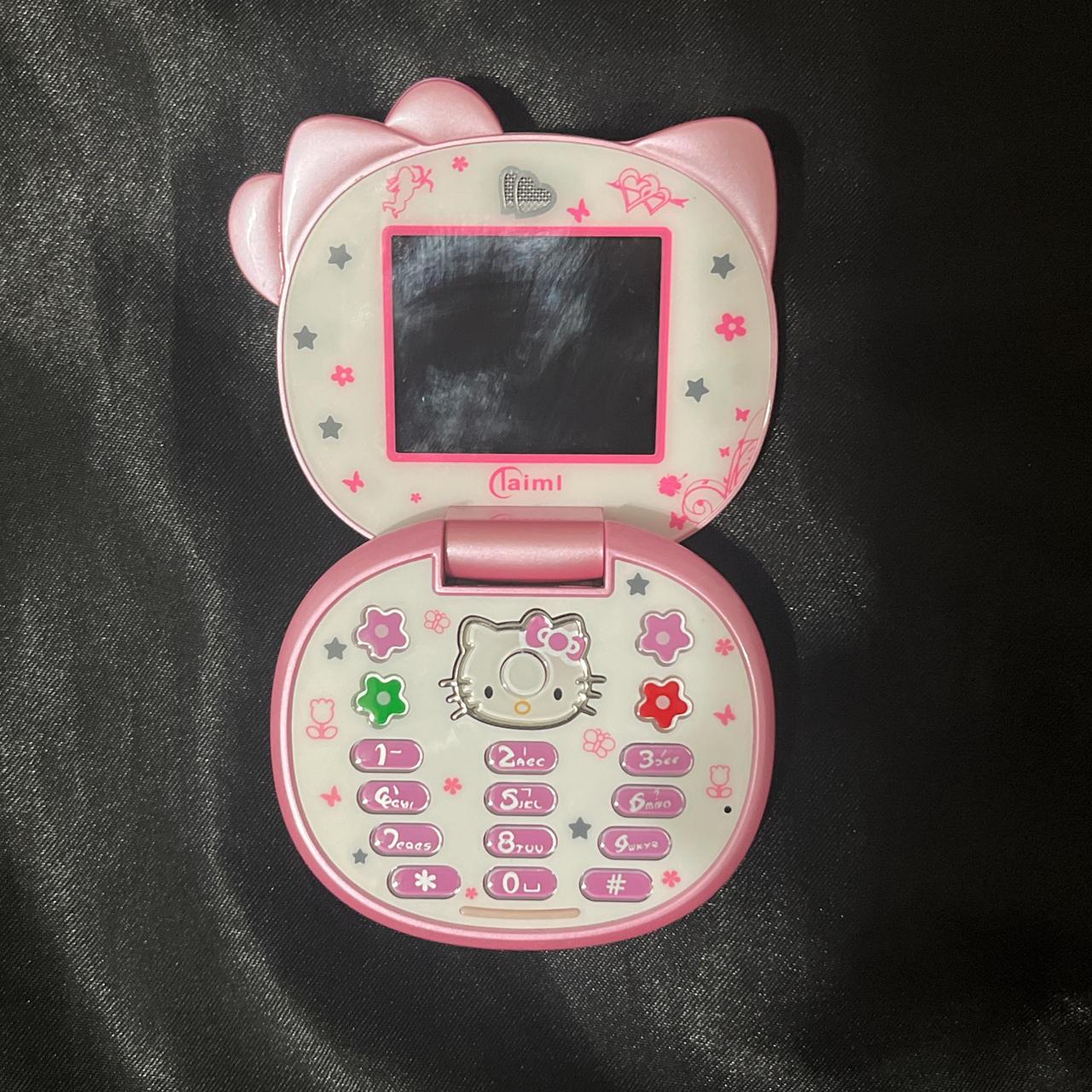 Hello Kitty hot pink fully functioning flip... - Depop