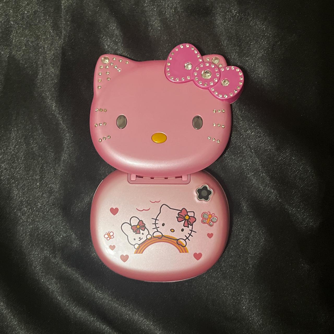Hello Kitty hot pink fully functioning flip... - Depop