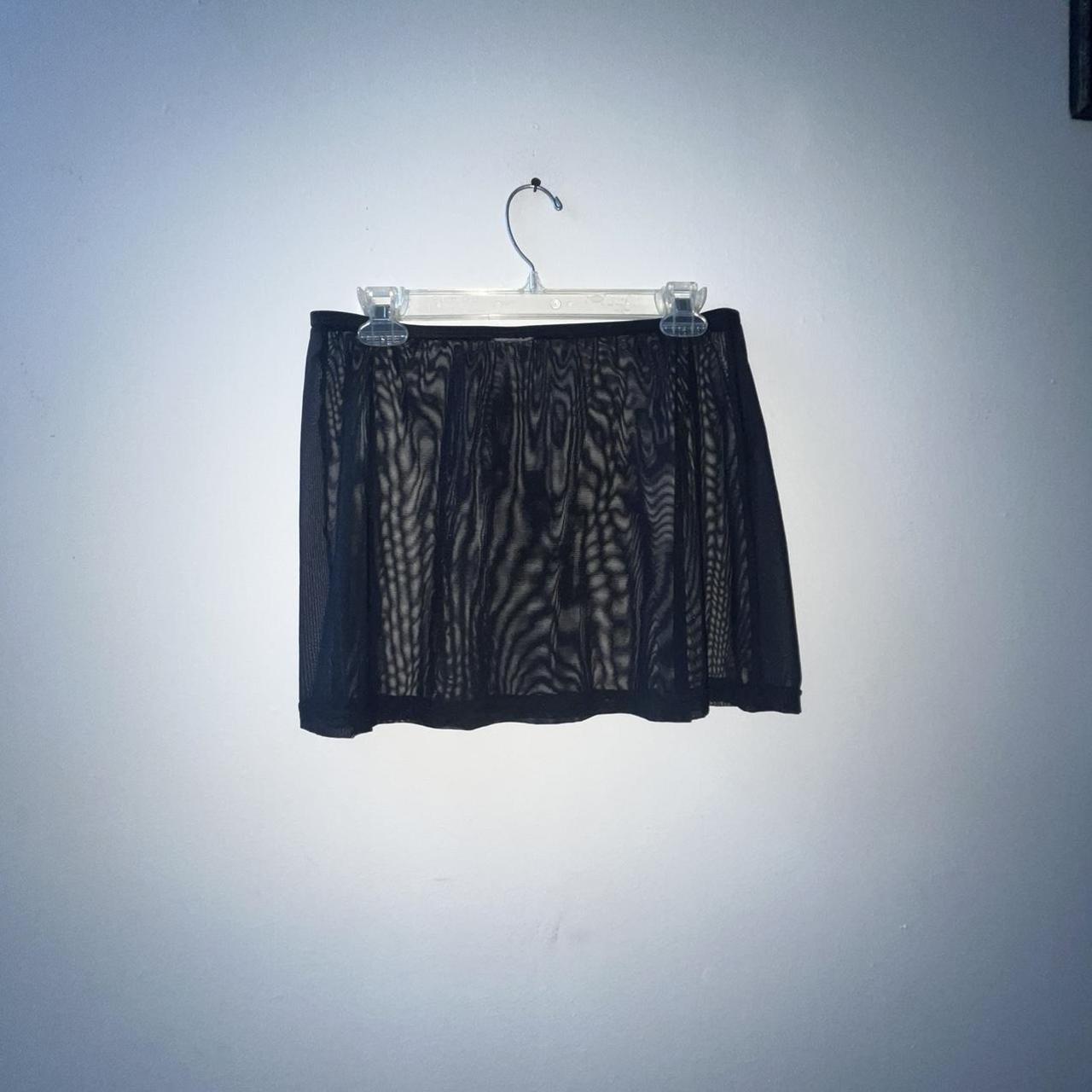 Cute lil sheer skirt. Can wear over something or... - Depop