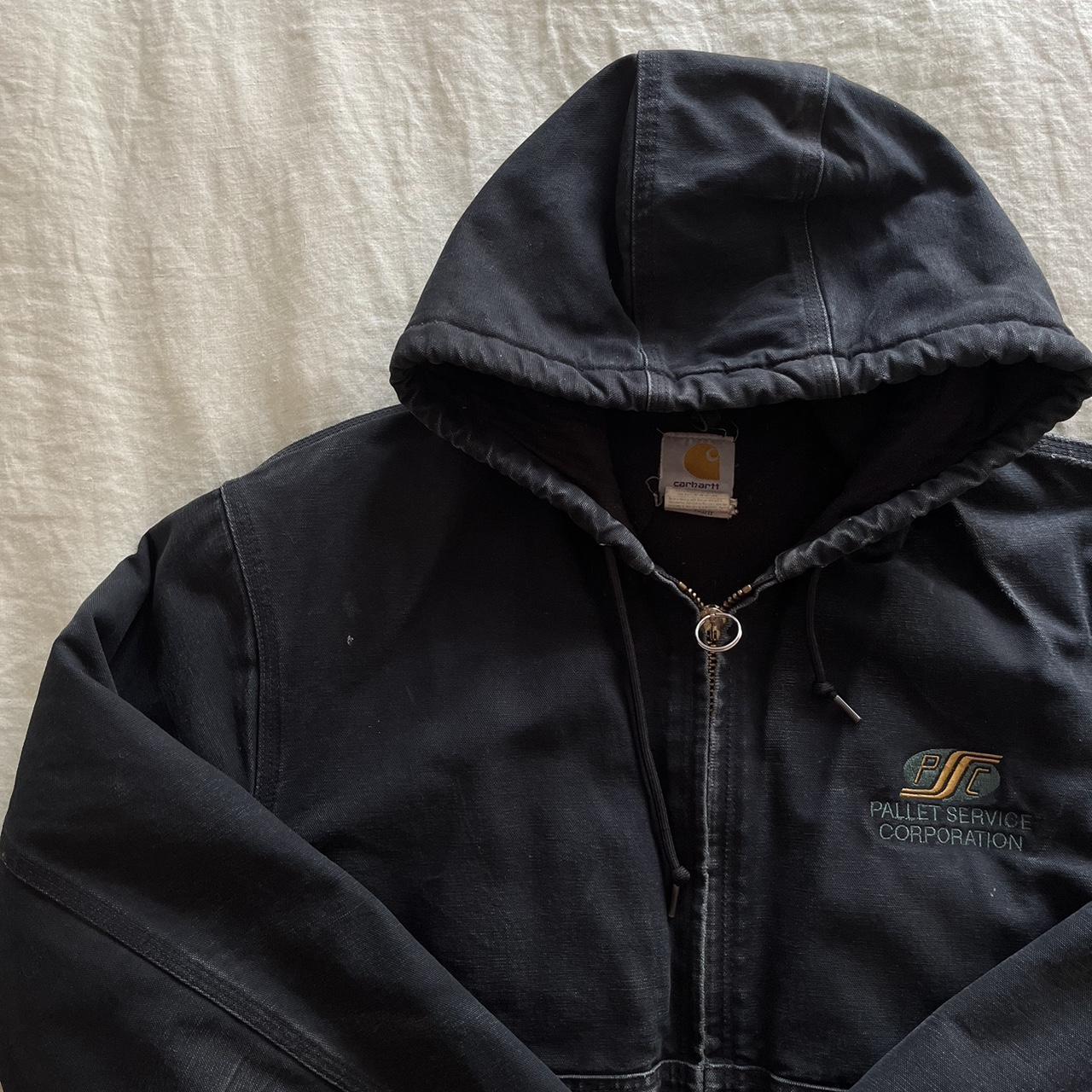 Black Carhartt jacket. See rips on the... - Depop