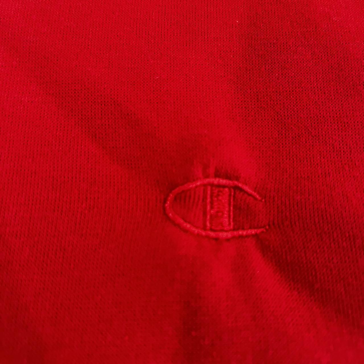 red champion hoodie says XL but fits more of a L or M - Depop