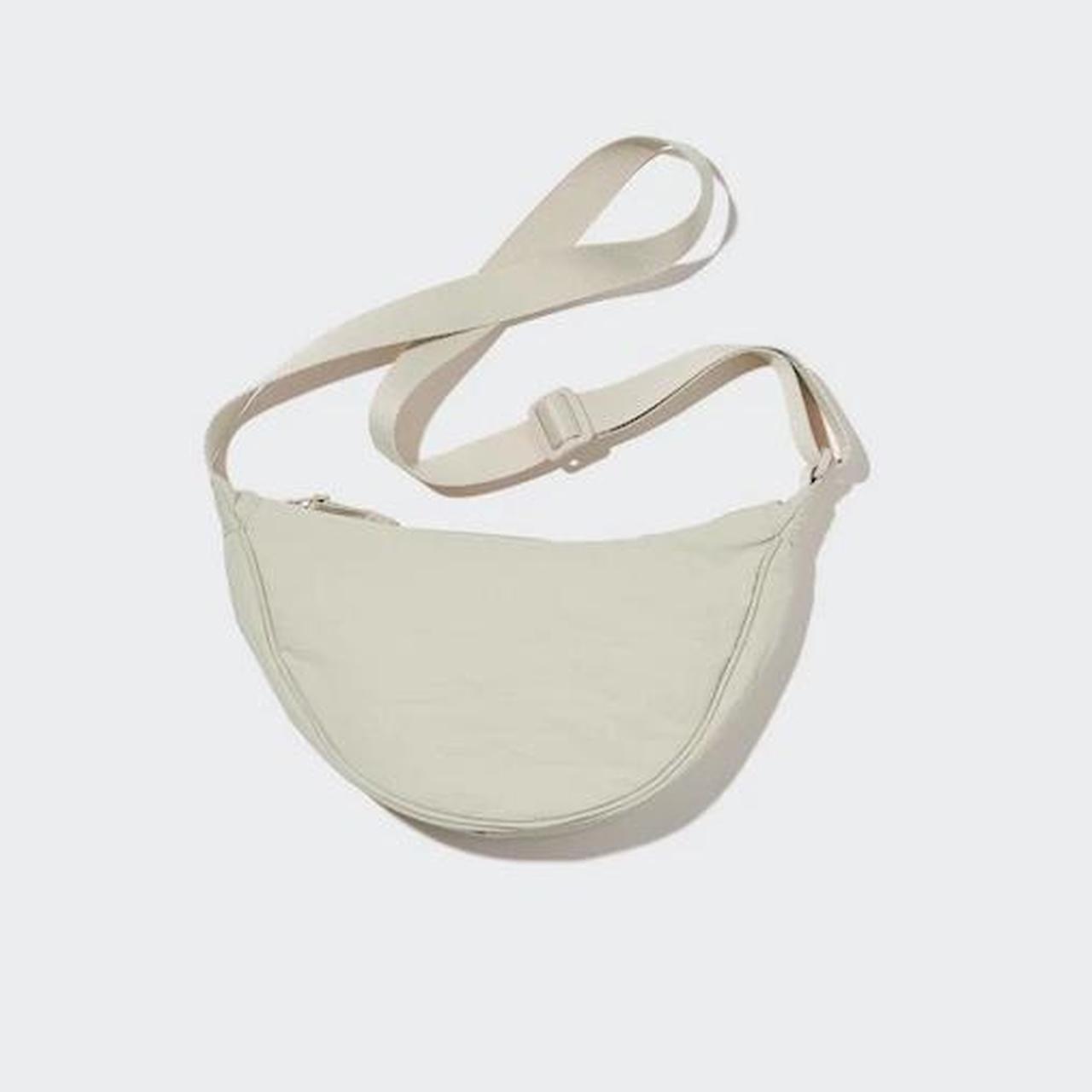 uniqlo round mini shoulder bag 🤍 Crescent bag, this... - Depop