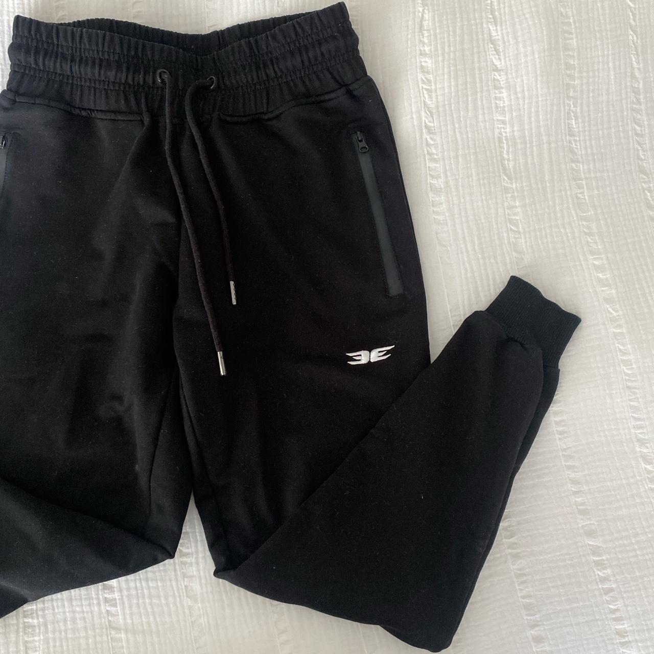 Black elite eleven tracksuit pants Size S... - Depop