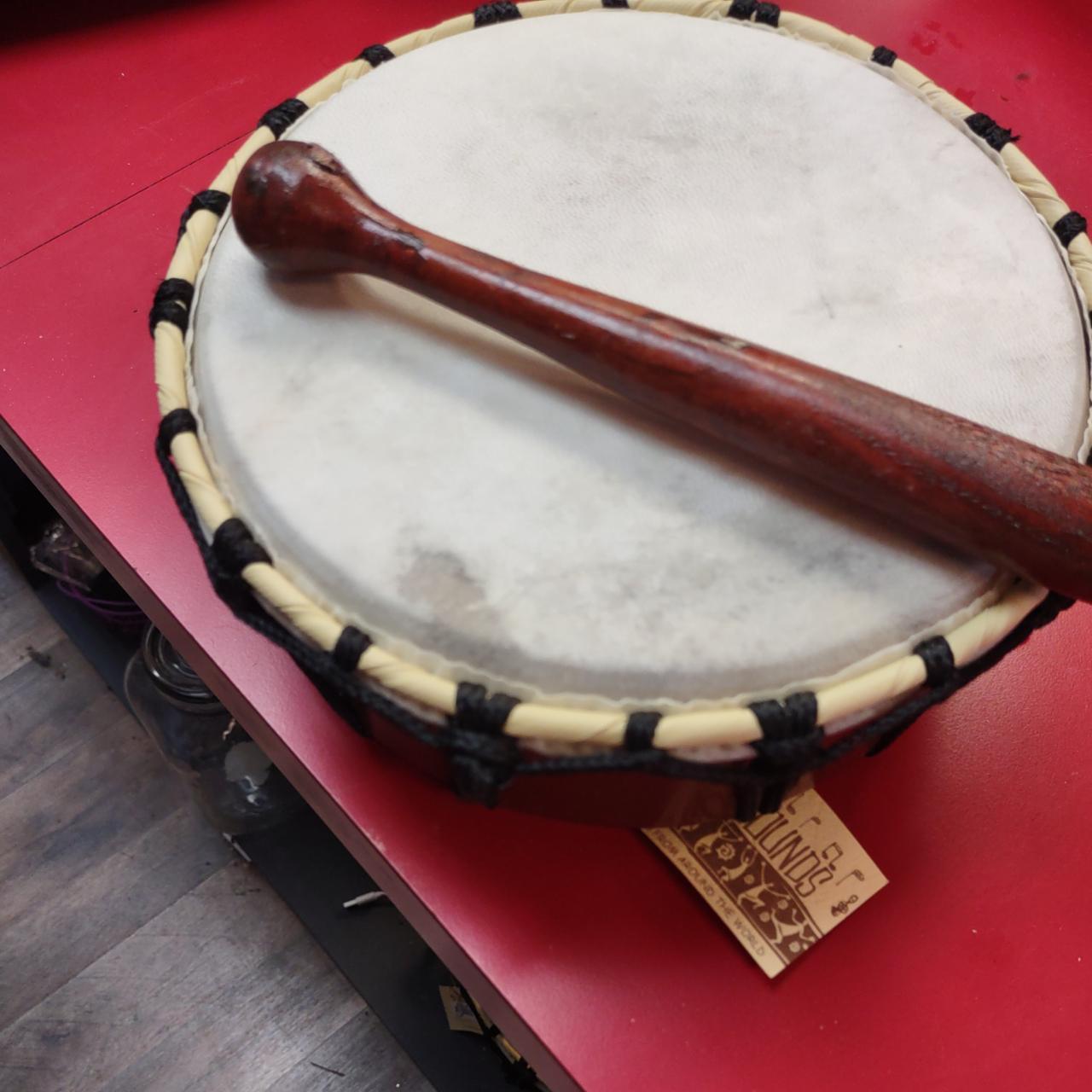Small wooden drum with stick from Native Sounds - Depop