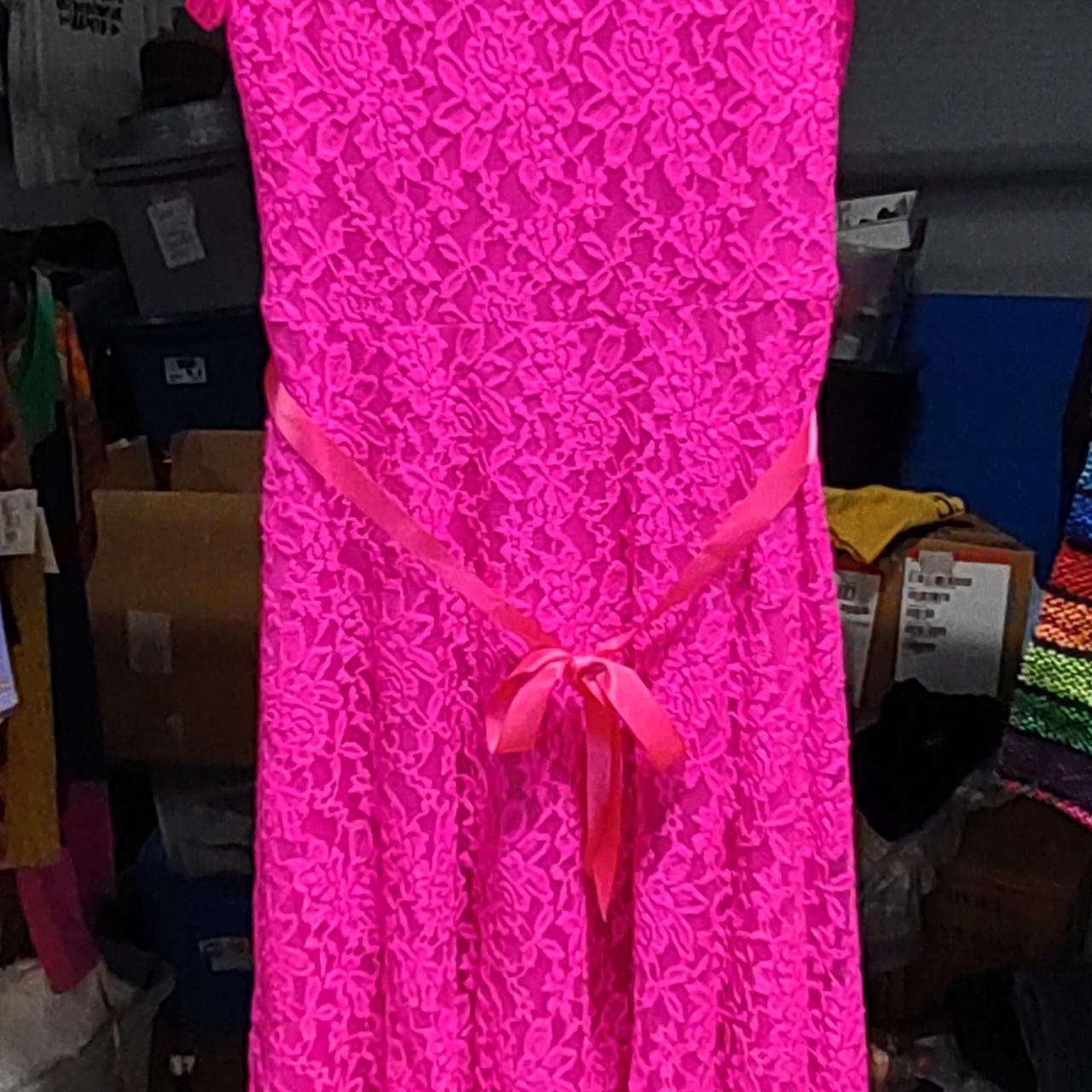 Pink lacy dress with ribbon tie at the waist from... - Depop