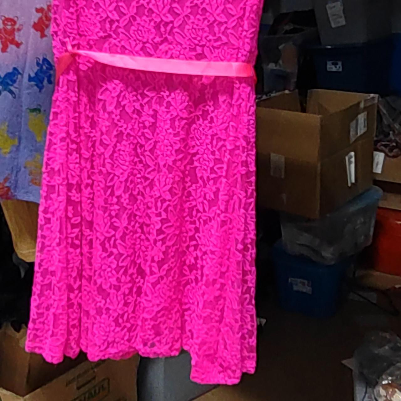 Pink lacy dress with ribbon tie at the waist from... - Depop