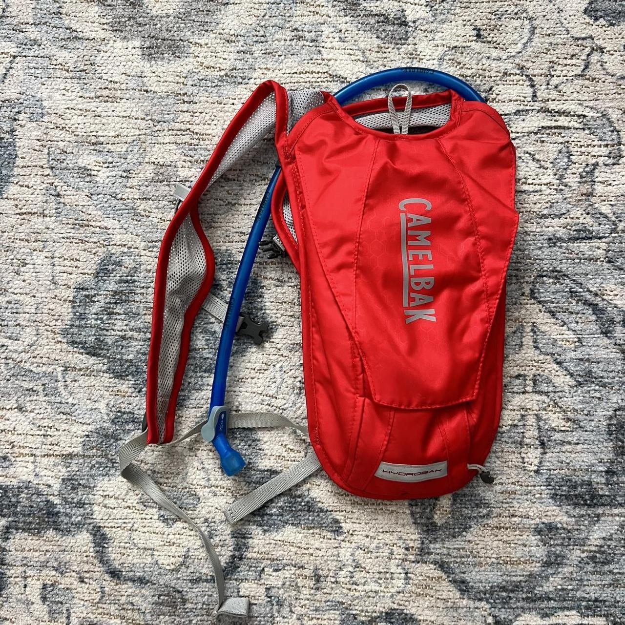Camelbak red backback with water pouch In great... | Depop