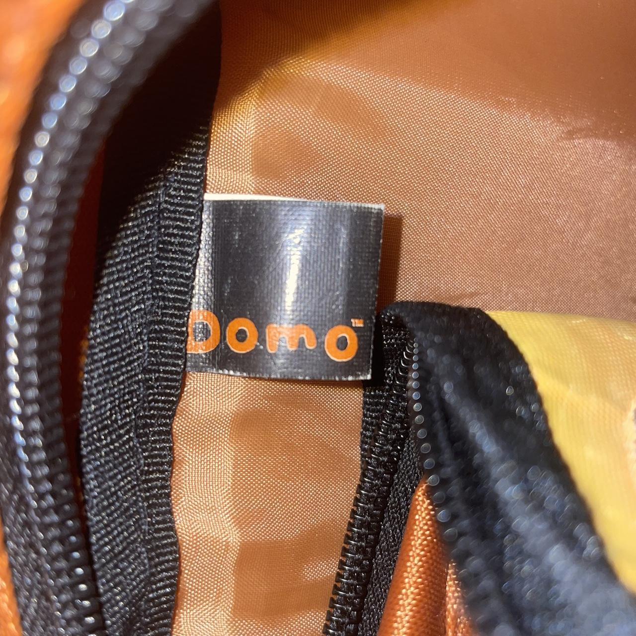 official licensed domo backpack dm me for... - Depop