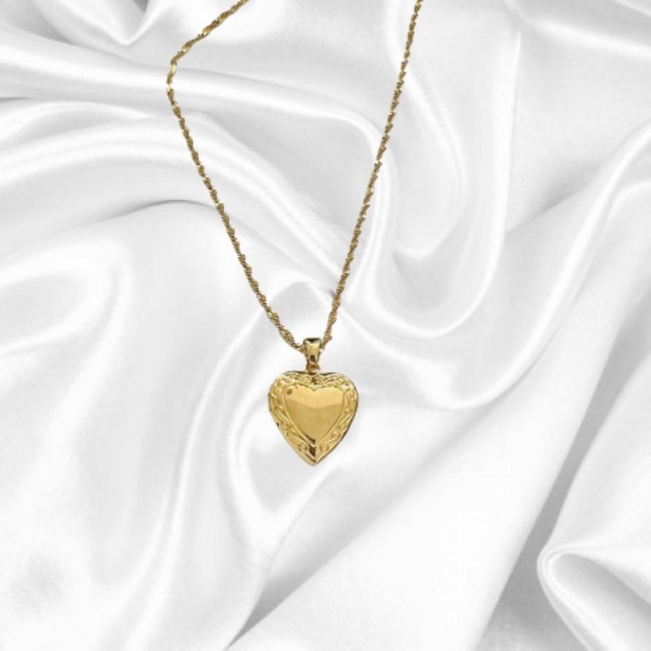 Brand New! Darling gold plated locket of love... - Depop