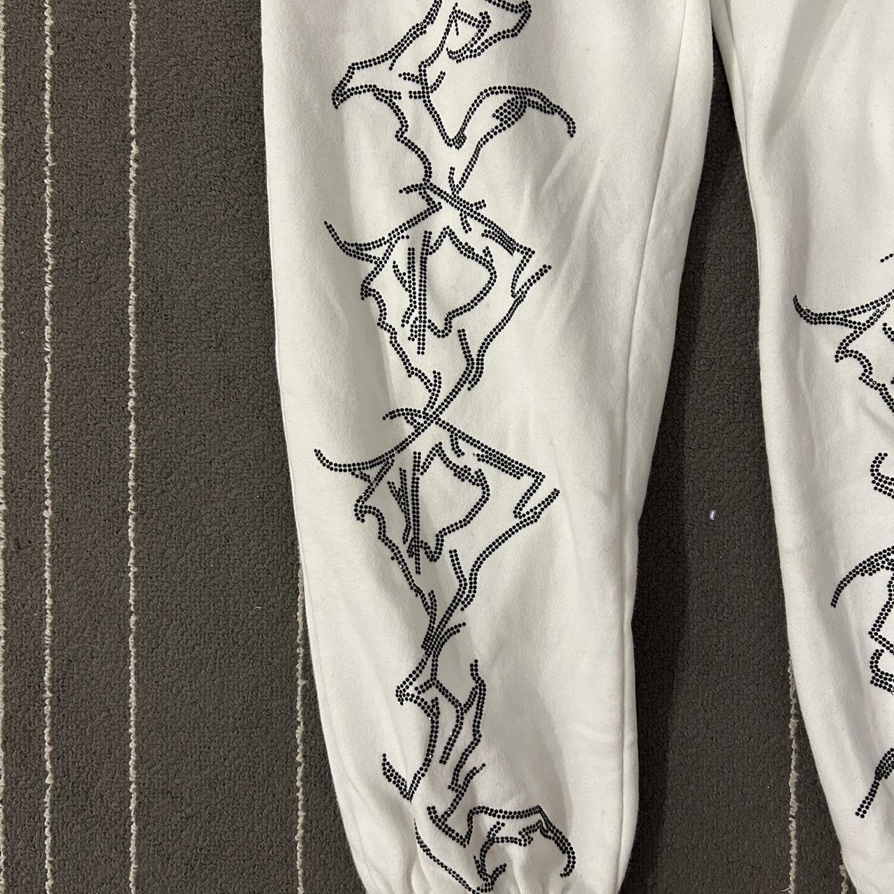 adika women’s white and black rhinestone flame “cool... - Depop