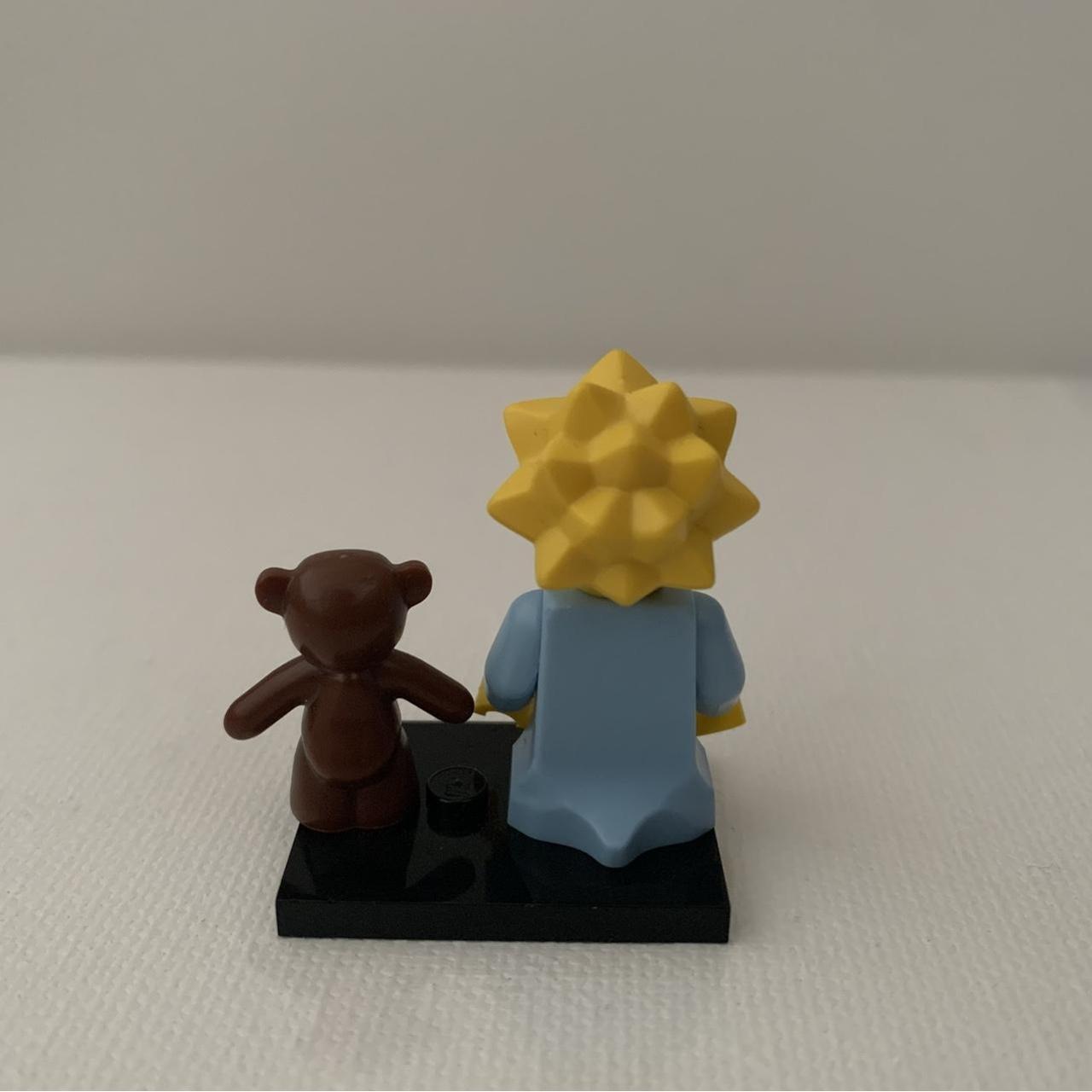 Maggie Simpson lego mini figure, comes with stand... - Depop