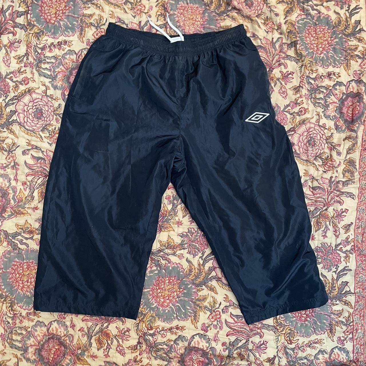 Umbro 3/4 track suit bottoms. Really cool length on... - Depop