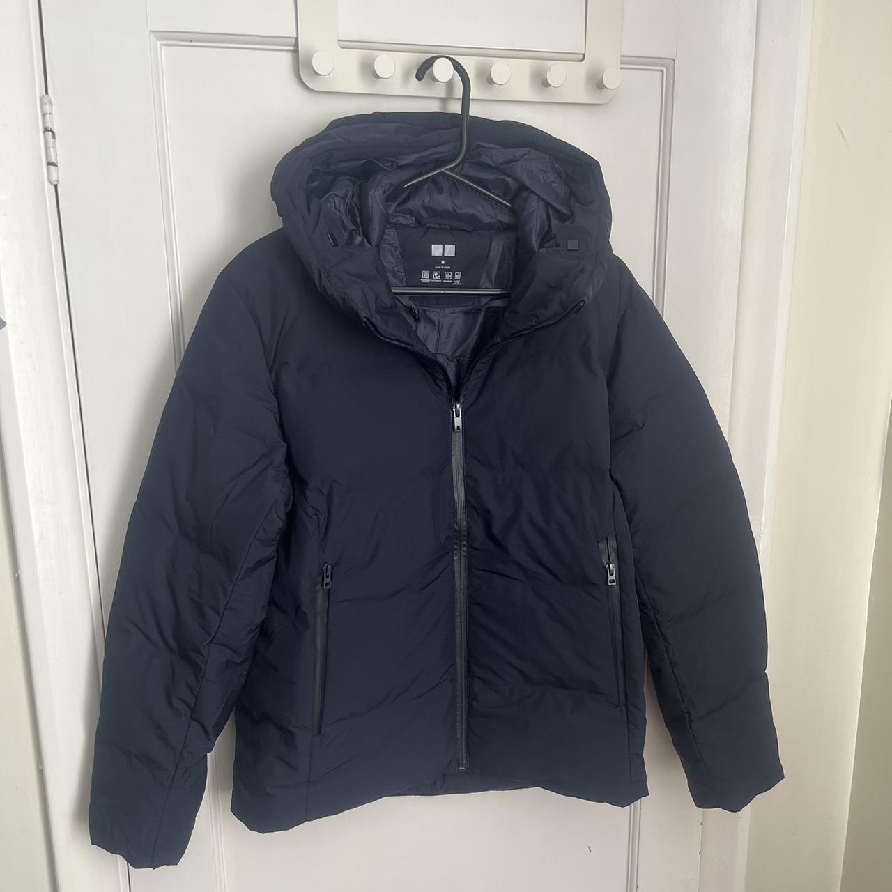 Uniqlo seamless down jacket -Colour: navy -... - Depop