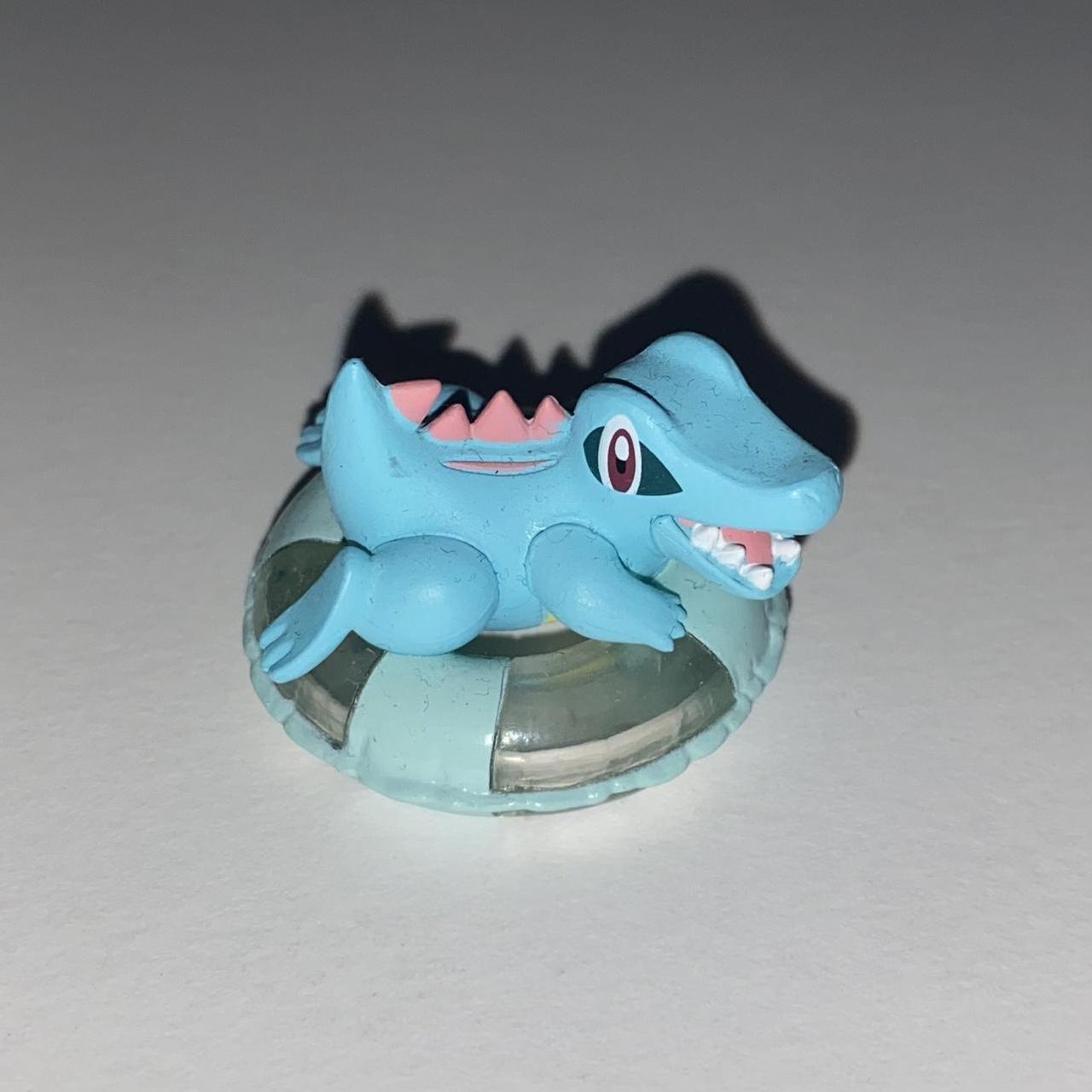 Totodile on floatie summer gachapon Pokémon... - Depop