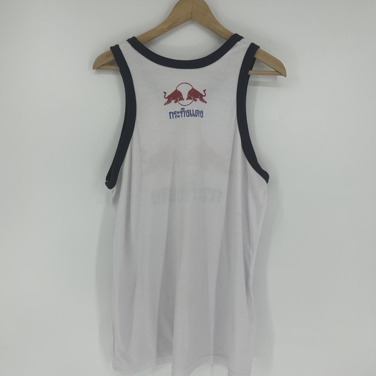 Vintage Thai Red Bull tank top Stains shown in... - Depop