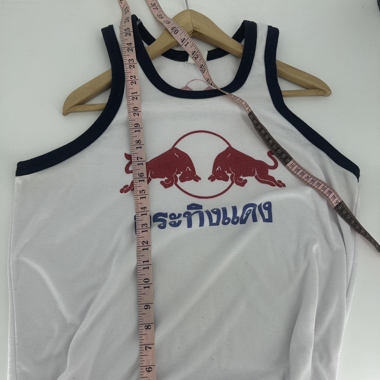 Vintage Thai Red Bull tank top Stains shown in... - Depop