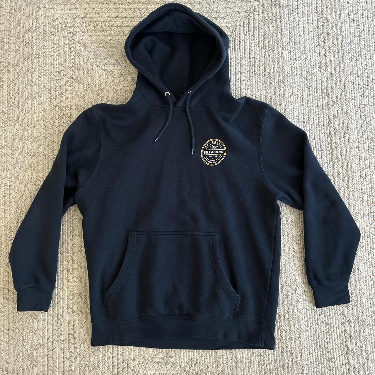 Black and gold billabong hoodie - Depop