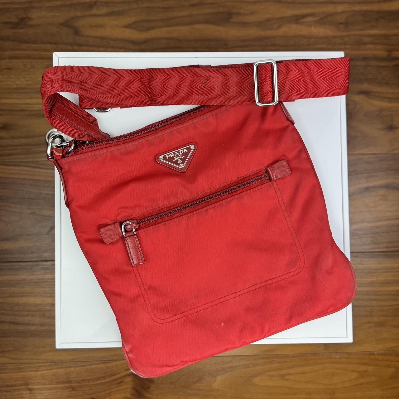 Red prada clip 8/10 condition Comes with dust bag... - Depop