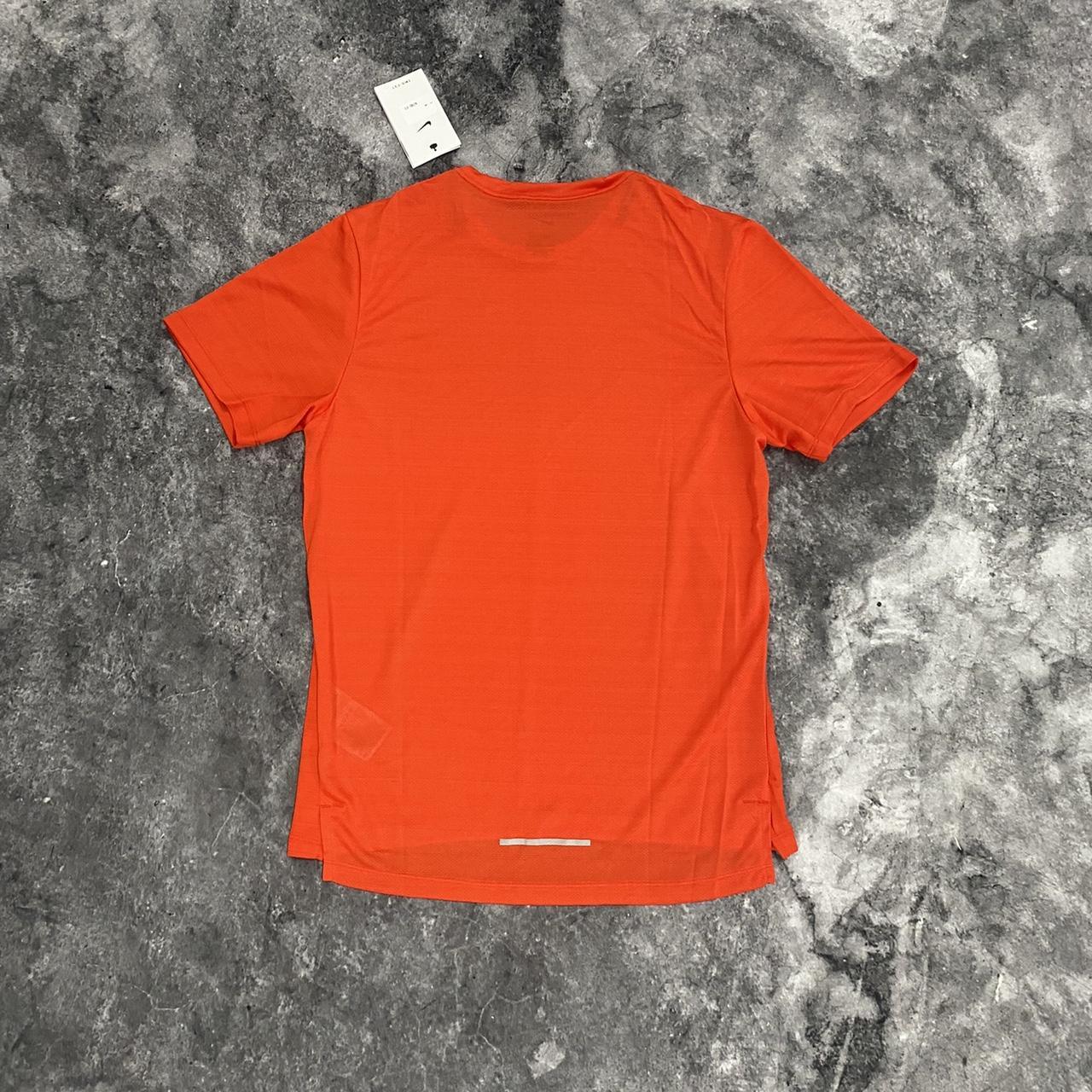 Red Nike Miler Tee Brand new with tags never been... - Depop