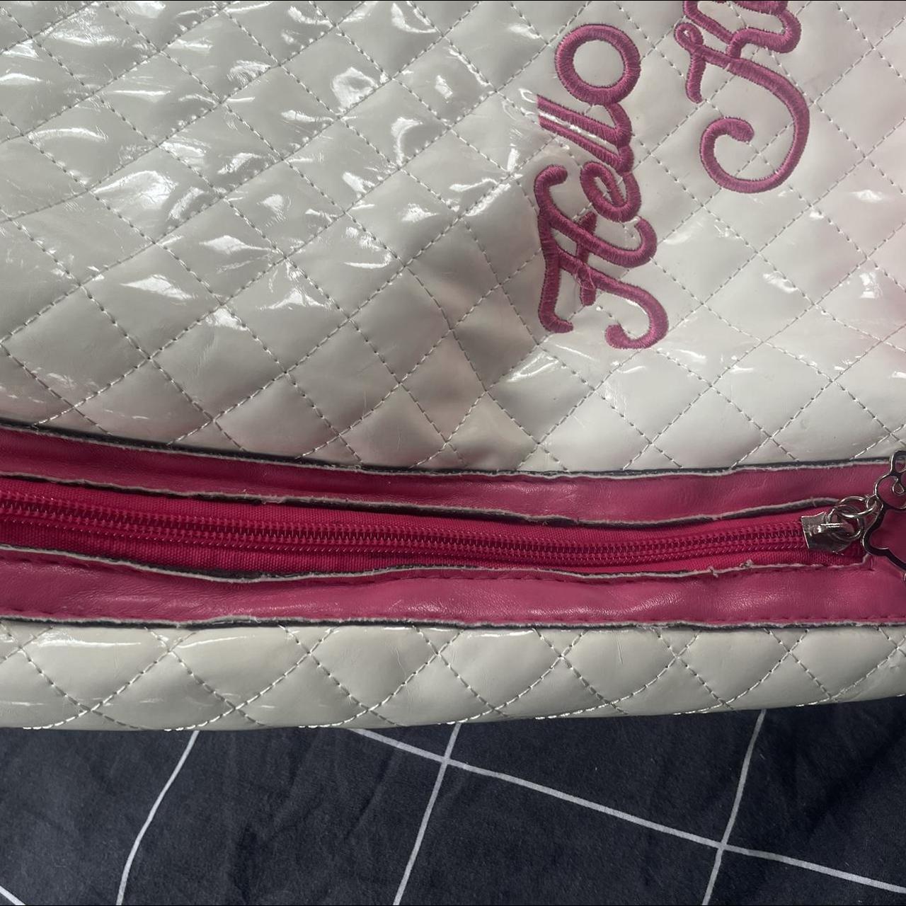 draw string hello kitty bag. the straps are a zipper... - Depop