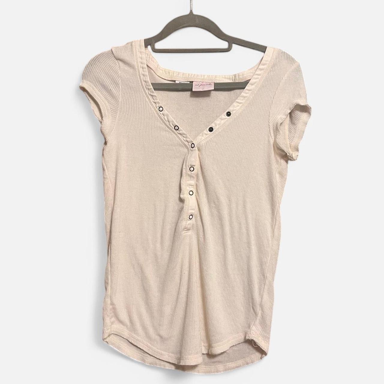 out from under cream button-up shirt. the buttons... | Depop