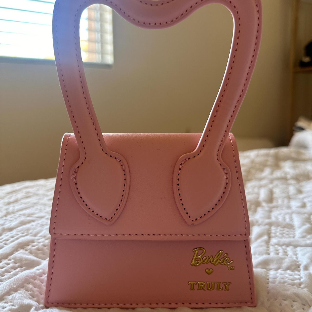 Barbie bag. Petite in size. Comes with longer strap.... - Depop