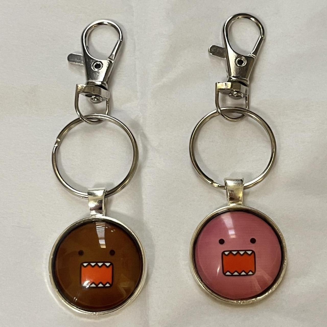 matching domo keychains! the pendant on the keychain... - Depop