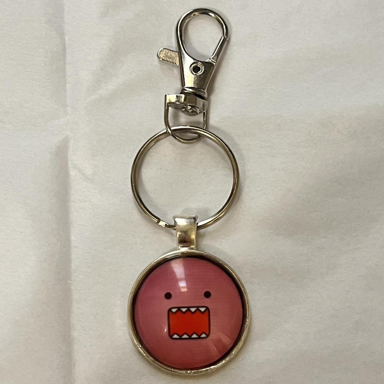 matching domo keychains! the pendant on the keychain... - Depop