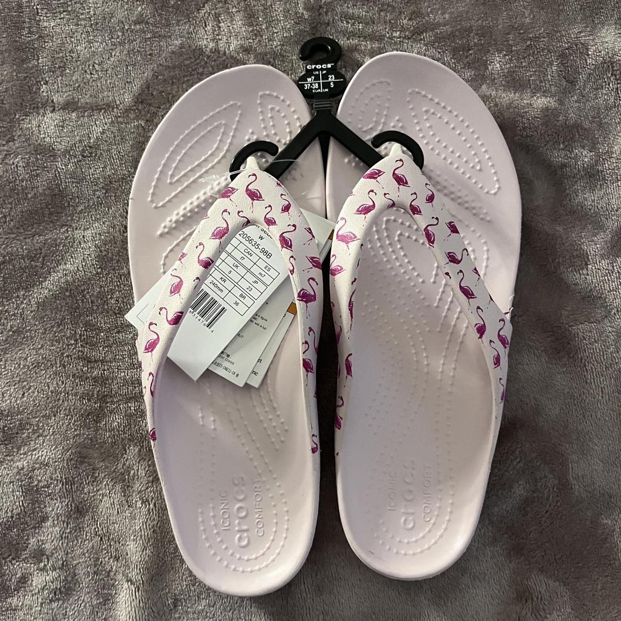 Crocs Women's Pink Flipflops | Depop