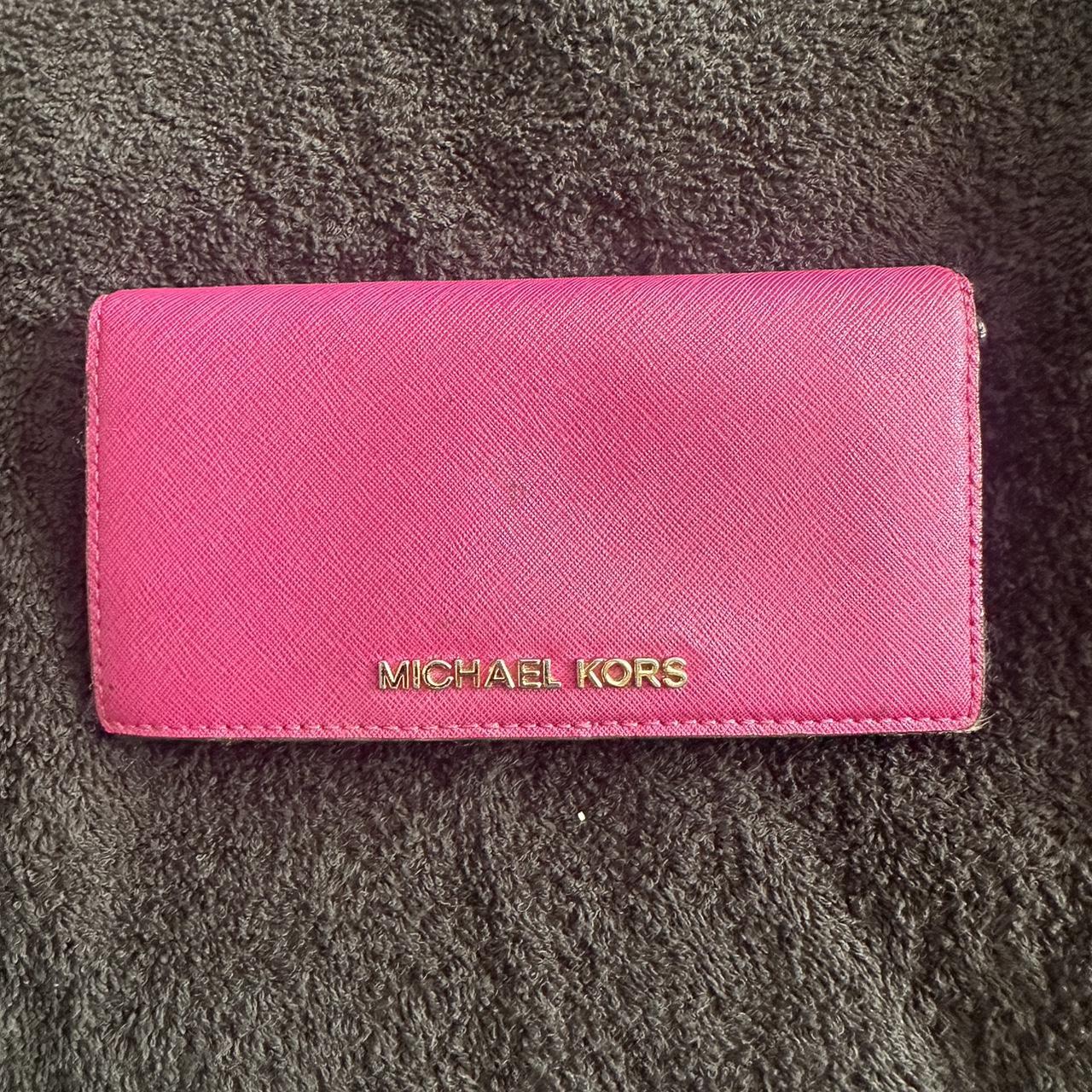 Michael Kors pink purse, well worn some small black... - Depop