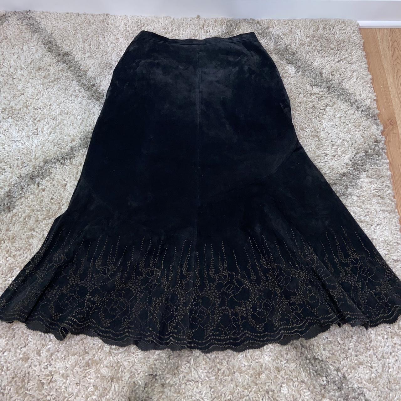 long black skirt with design texture in the bottom... - Depop
