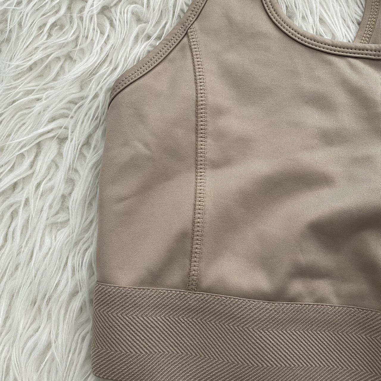 Silky beige sports bra . Never been worn brand new - Depop