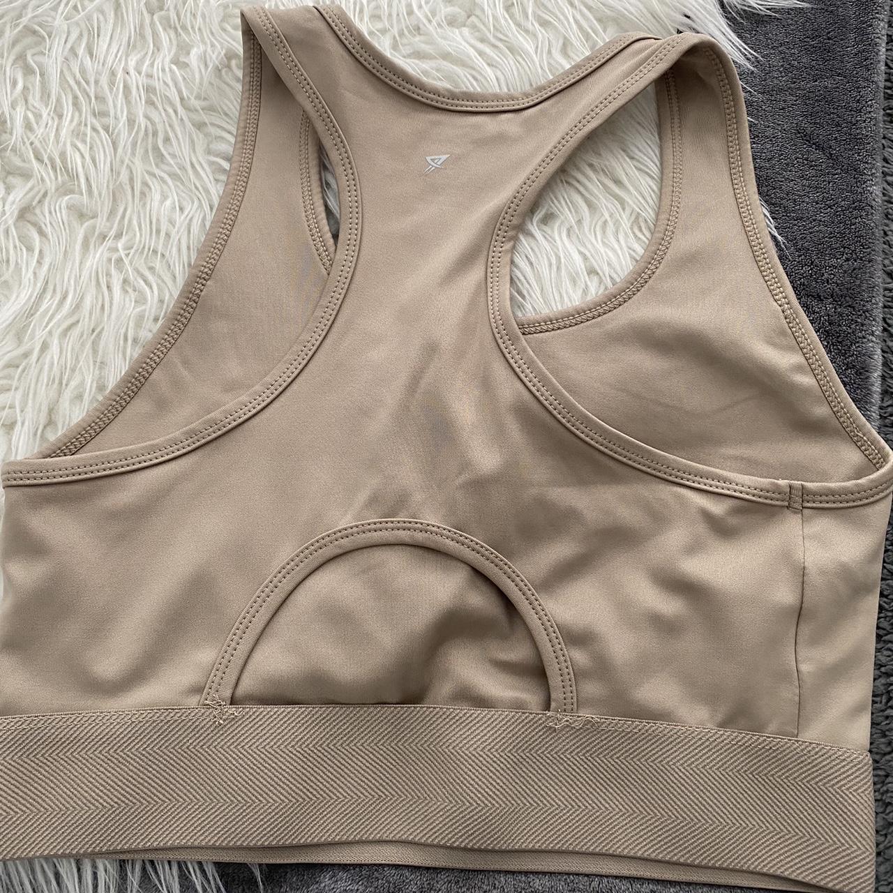 Silky beige sports bra . Never been worn brand new - Depop