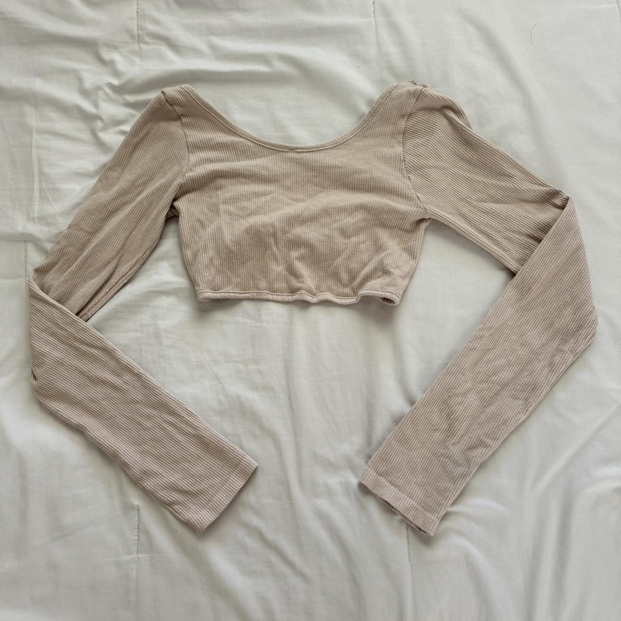 Tan and cream long sleeve crop top with twist front... - Depop