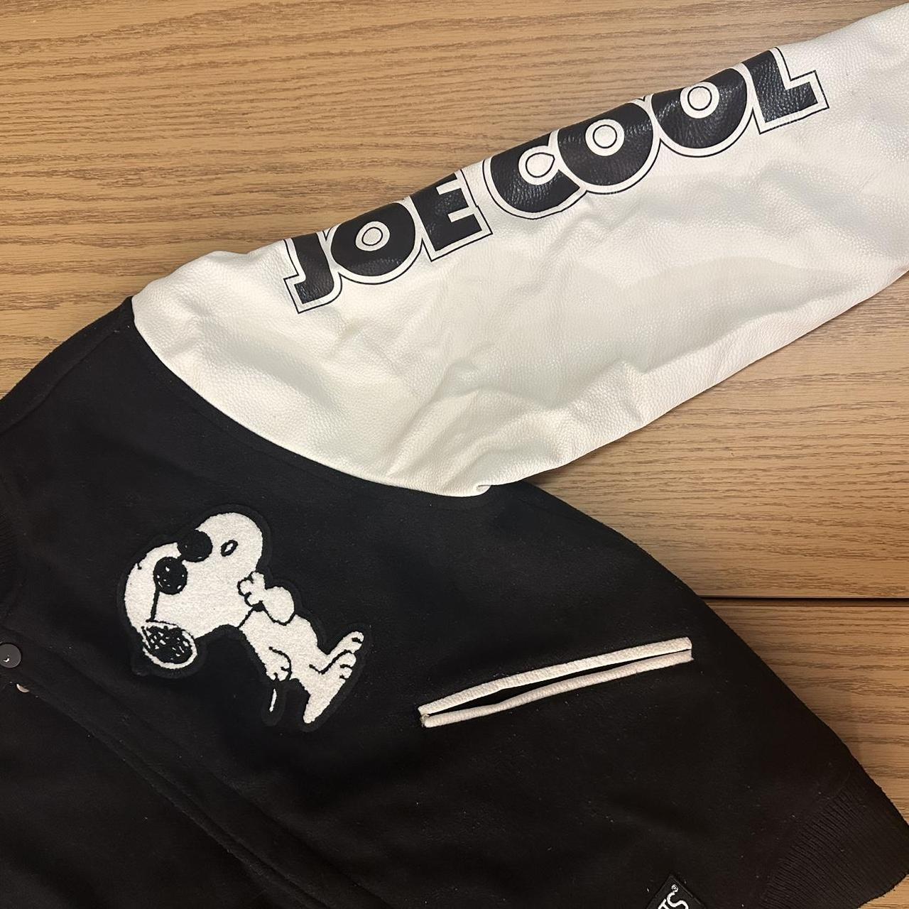 snoopy varsity jacket w leather sleeves and quilted... - Depop