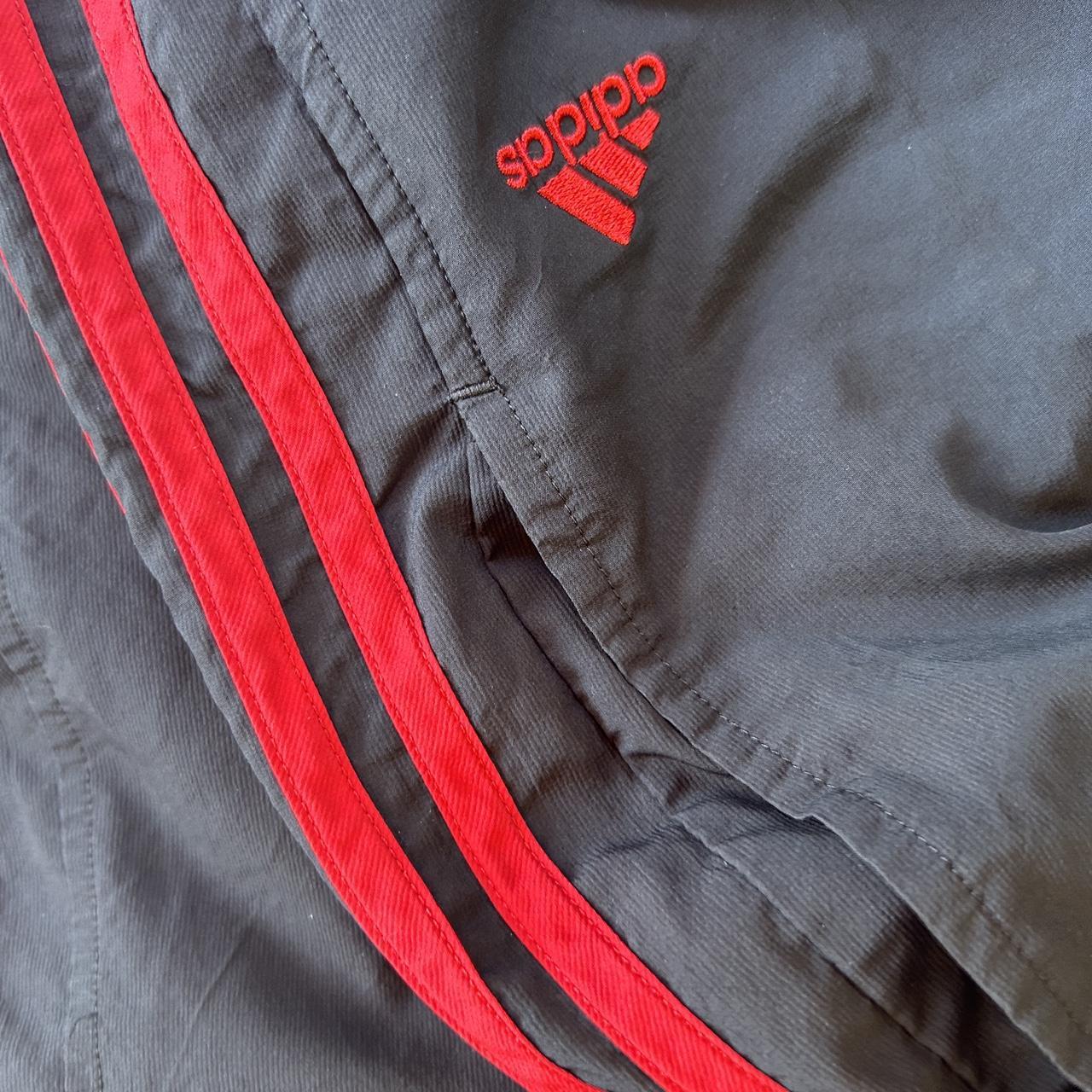 Black and red addidas track pants Kids size L or... - Depop