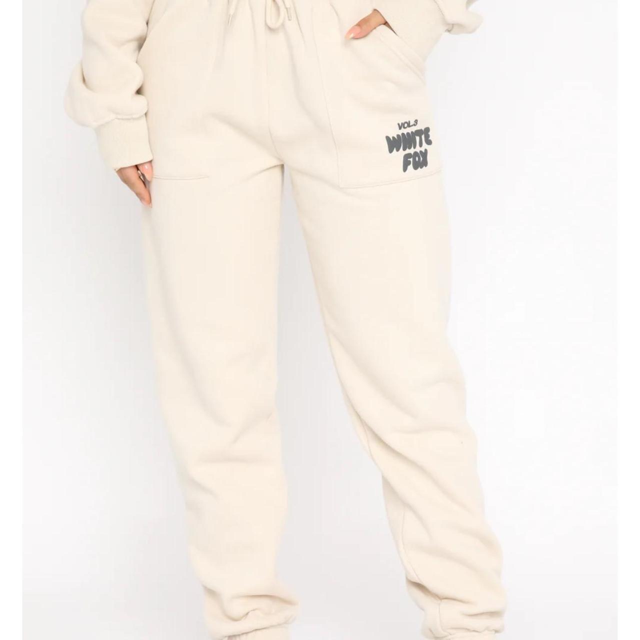 White fox tracksuit bottoms - Depop
