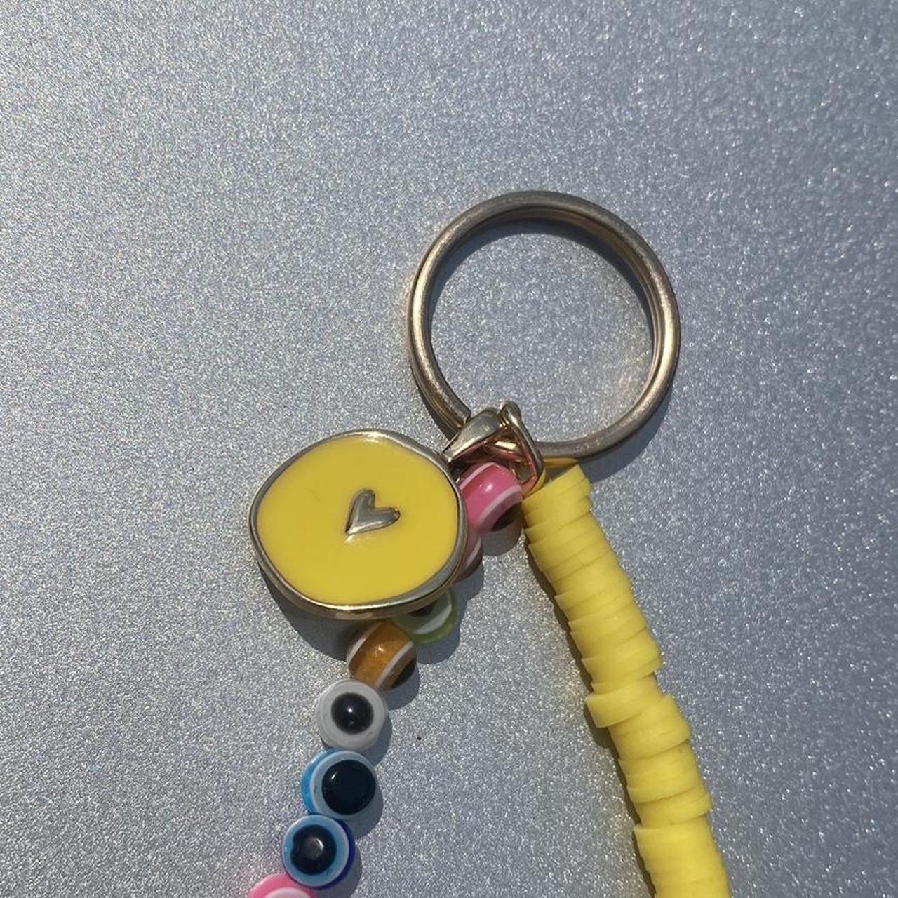 yellow keychain - Depop