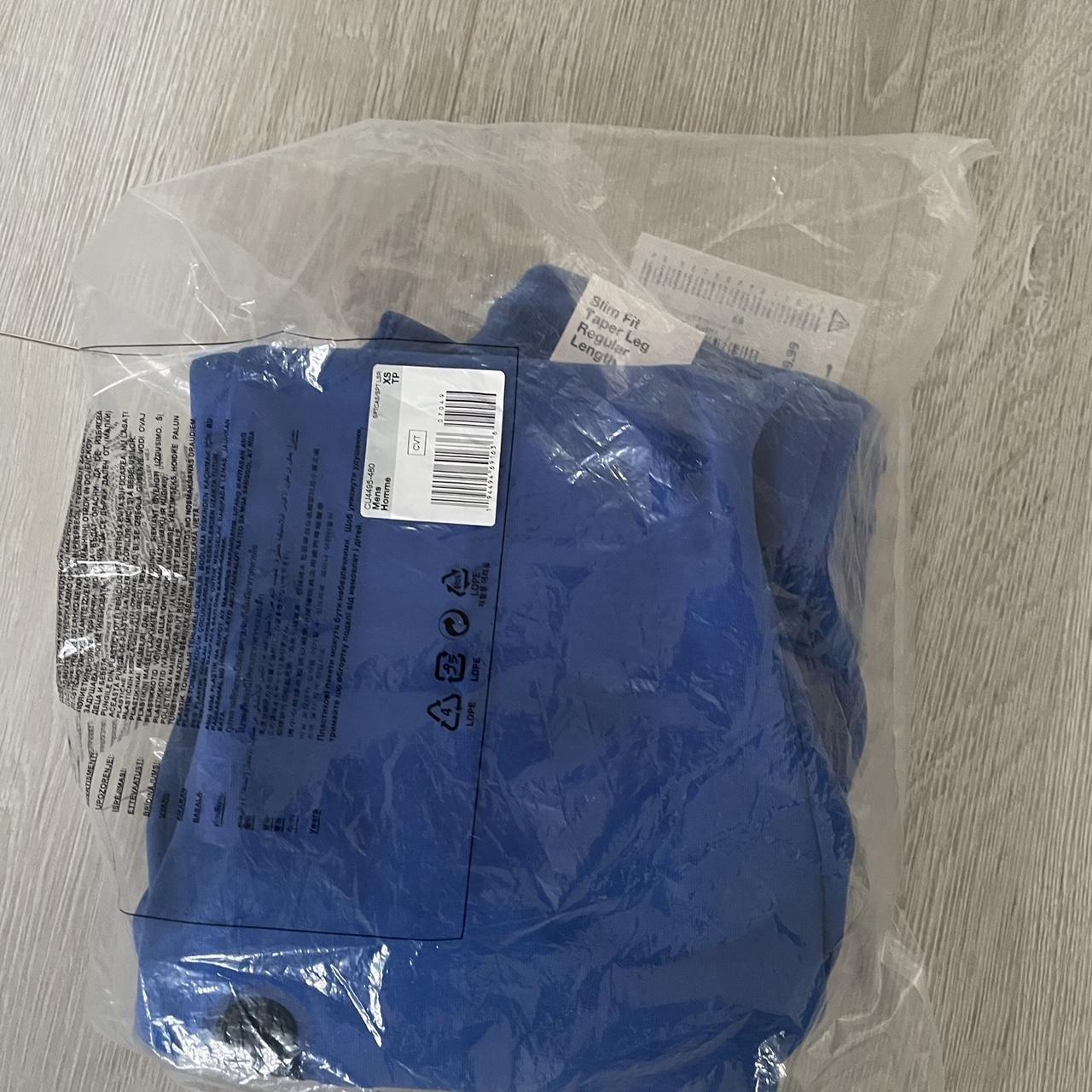 New Season Royal blue tech fleece bottoms size XS... - Depop