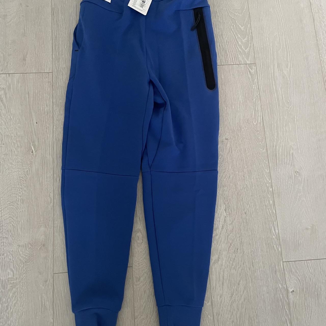 New Season Royal blue tech fleece bottoms size XS... - Depop