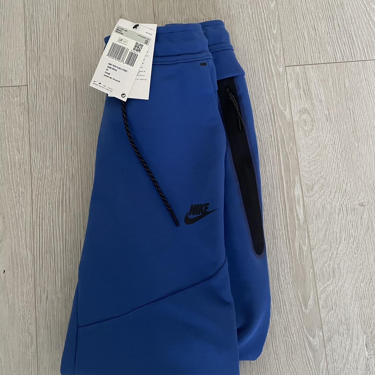 New Season Royal blue tech fleece bottoms size XS... - Depop