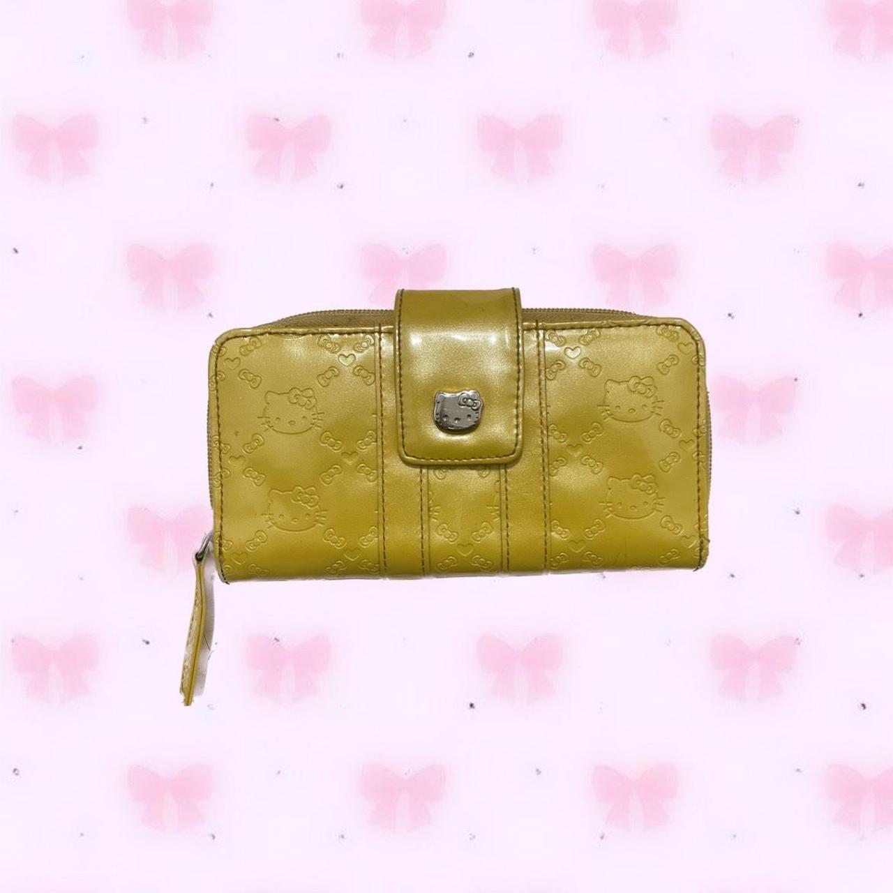 Hello Kitty yellow wallet , preowned as noticed in... - Depop